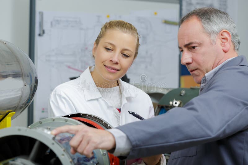Female Apprentice Being Trained in Aerospace Workshop Stock Image ...