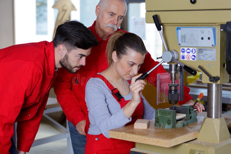 Female Apprentice Using Milling Machine Stock Photo - Image of trainee ...