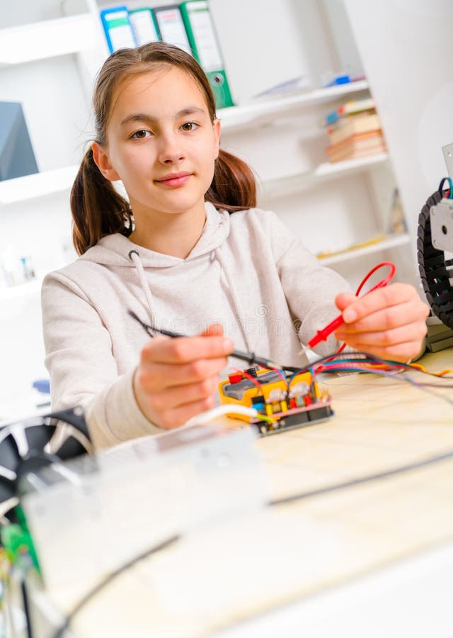 Female Apprentice Working on CNC Machinery Stock Photo - Image of ...