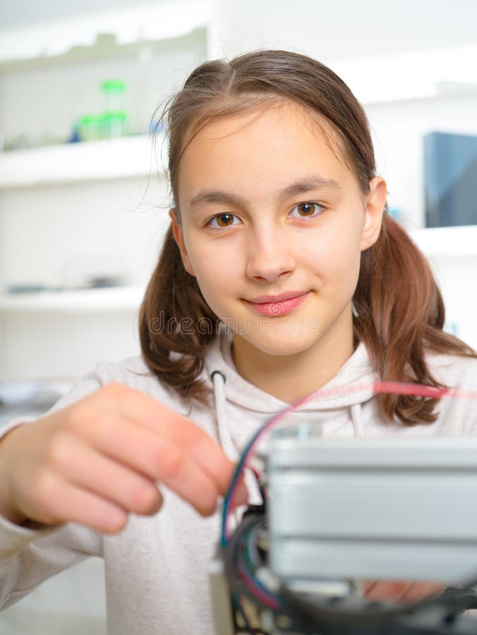 Female Apprentice Working on CNC Machinery Stock Photo - Image of ...
