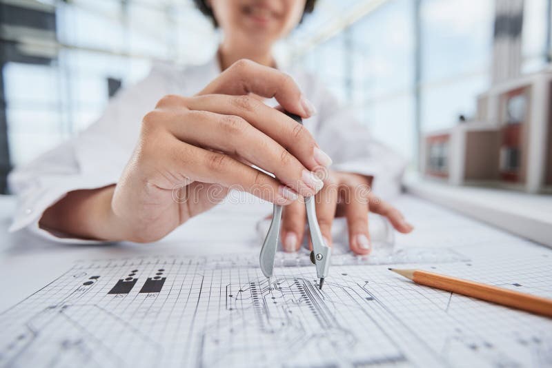 Female Architect Designer Working on Blueprints Stock Photo - Image of ...