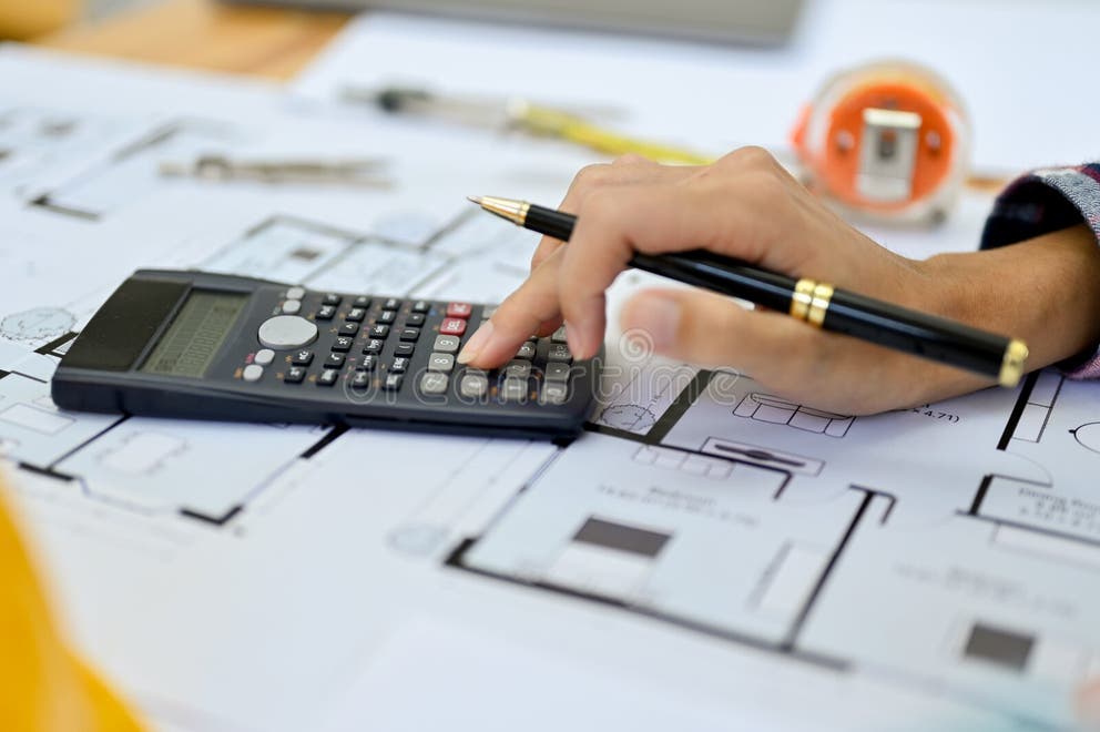 Female Architect or Engineer Using Calculator, Checking the Final ...