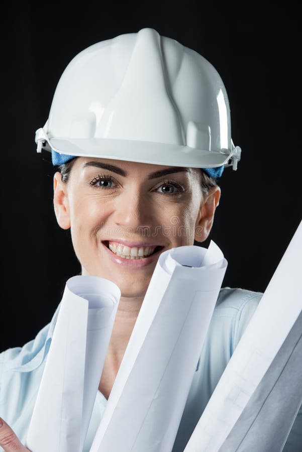 Female architect in helmet stock photo. Image of business - 91782692
