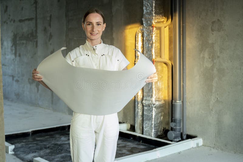 Female Architect Manages the Construction Site, Supervising the ...
