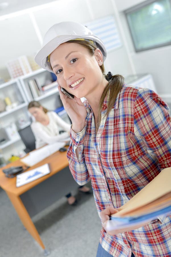 Female architect in office stock photo. Image of drawing - 89313106
