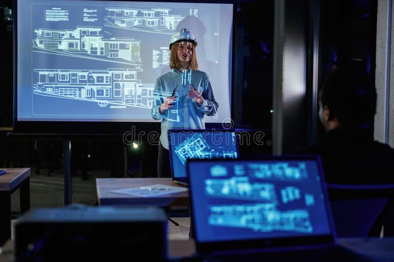Female Architect is Showing Construction Site Plan for Building on ...