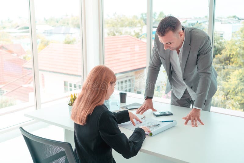 Female Architect Showing Her Boss the Real Estate Building Pl Stock ...