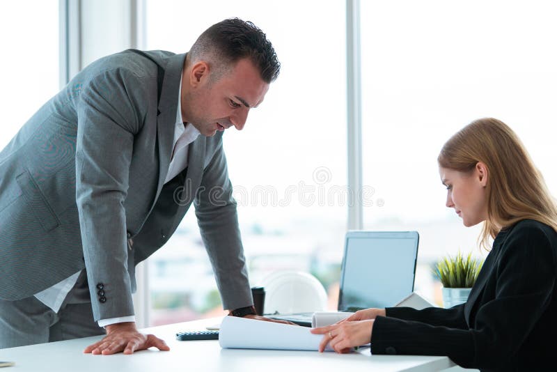 Female Architect Showing Her Boss the Real Estate Building Pl Stock ...