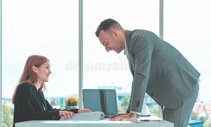 Female Architect Showing Her Boss the Real Estate Building Pl Stock ...