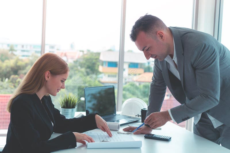 Female Architect Showing Her Boss the Real Estate Building Pl Stock ...