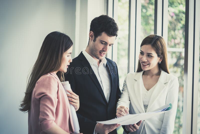 Female Architect Showing Her Boss the Real Estate Building Pl Stock ...