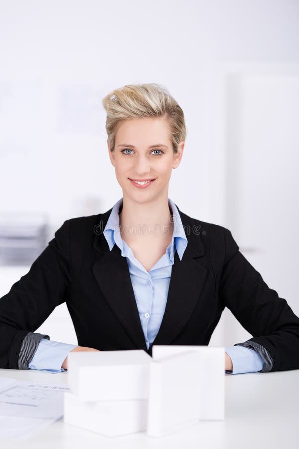 Female Architect Sitting at Desk Stock Image - Image of contractor ...