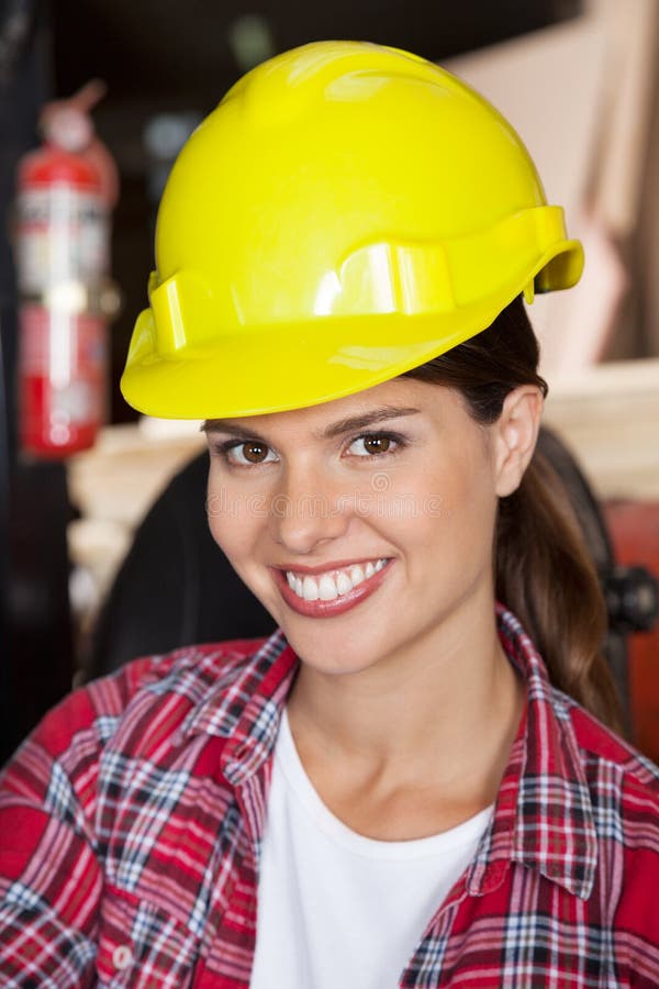 Female Architect Wearing Hardhat Stock Photo - Image of hardhat ...