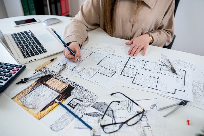 Female Architect Working Alone on Blueprint, Home Sketch with Tools at ...