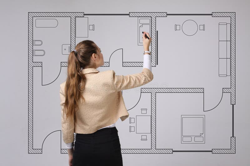 Female Architect Working with a Virtual Apartment Plan Stock Photo ...