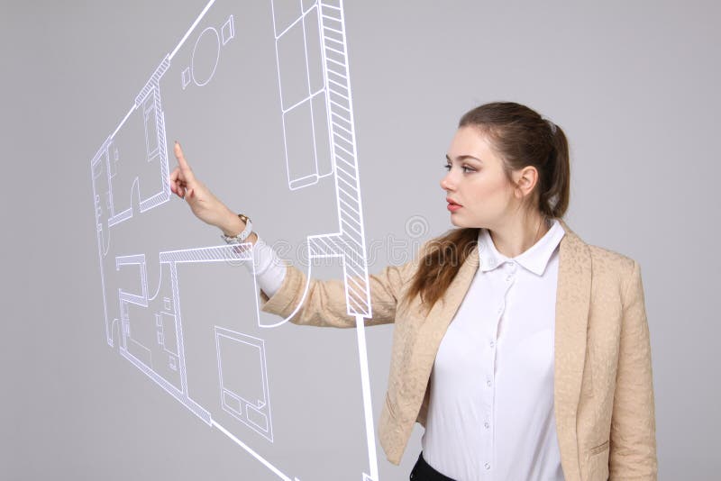 Female Architect Working with a Virtual Apartment Plan Stock Photo ...
