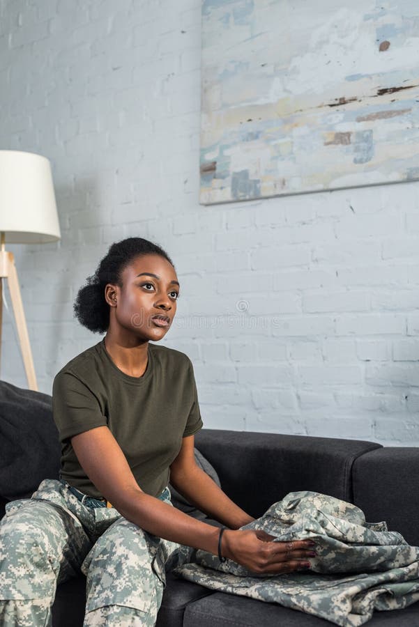 Female Army Soldier in Camouflage Clothes Sitting Stock Image - Image ...