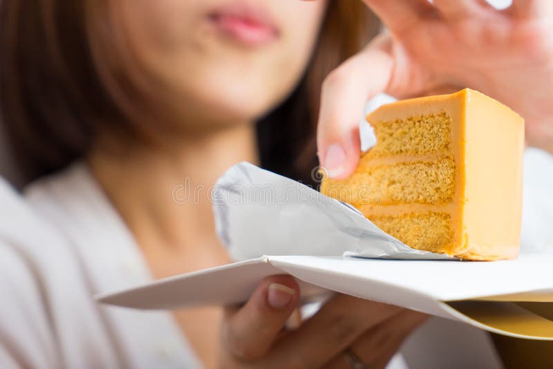 Female Asian is Eating Caramel Cake with Hand Stock Photo - Image of ...