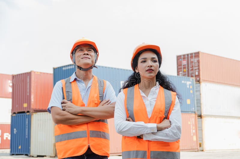 Female Asian Engineer and Foreman Engineer Loading Containers from ...