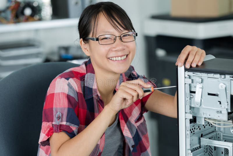 Female Asian Technician Working on Computer Stock Image - Image of ...