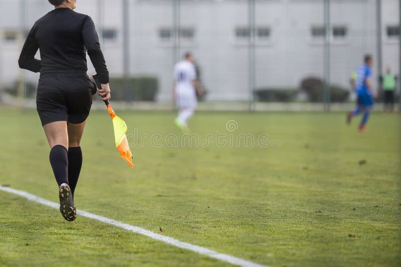 A Female Assistant Referee Runs by the Touchline Stock Photo - Image of ...