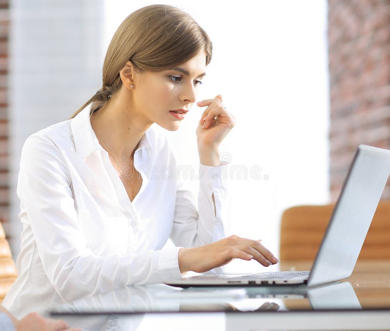 Female Assistant Working on Laptop in the Office. Stock Image - Image ...
