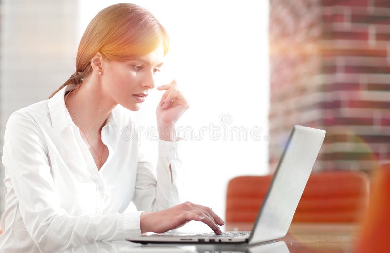Female Assistant Working on Laptop in the Office. Stock Photo - Image ...