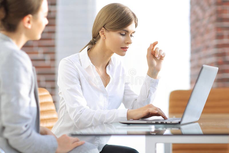 Female Assistant Working on Laptop in the Office. Stock Image - Image ...