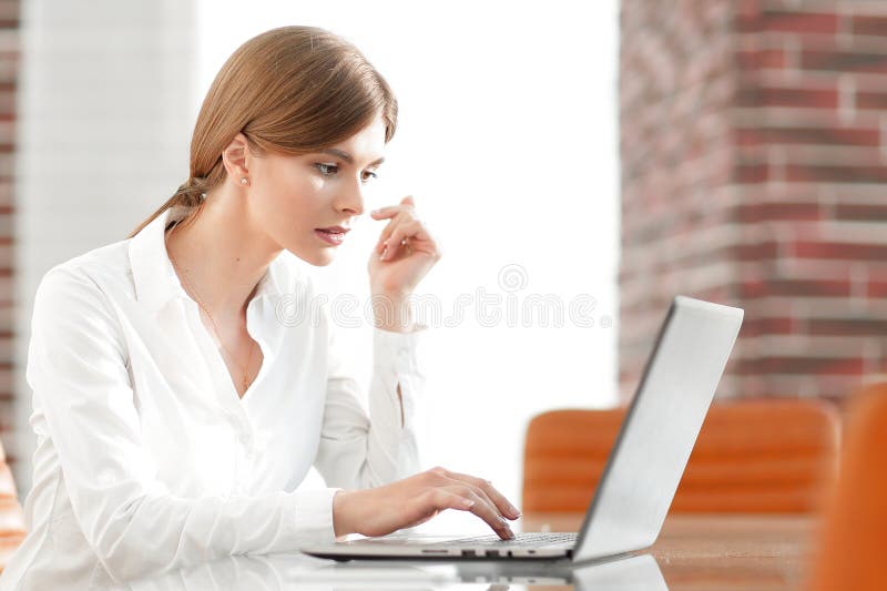 Female Assistant Working on Laptop in the Office. Stock Photo - Image ...