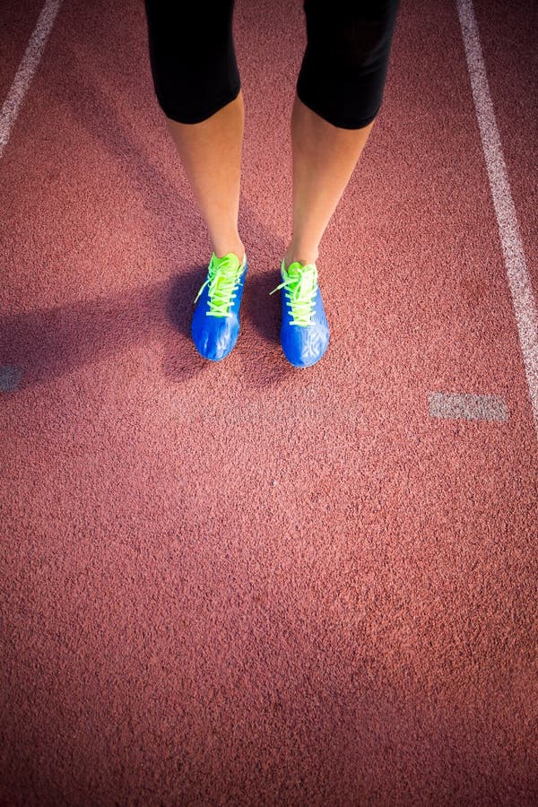 Female Athlete Feet Standing on the Running Track Stock Image - Image ...