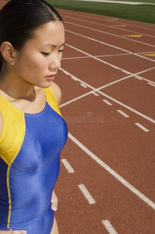 Female Athlete on Race Track Stock Image - Image of challenge, stadium ...