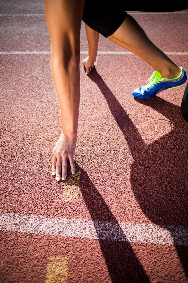 Female Athlete in Ready To Run Position Stock Photo - Image of athletic ...