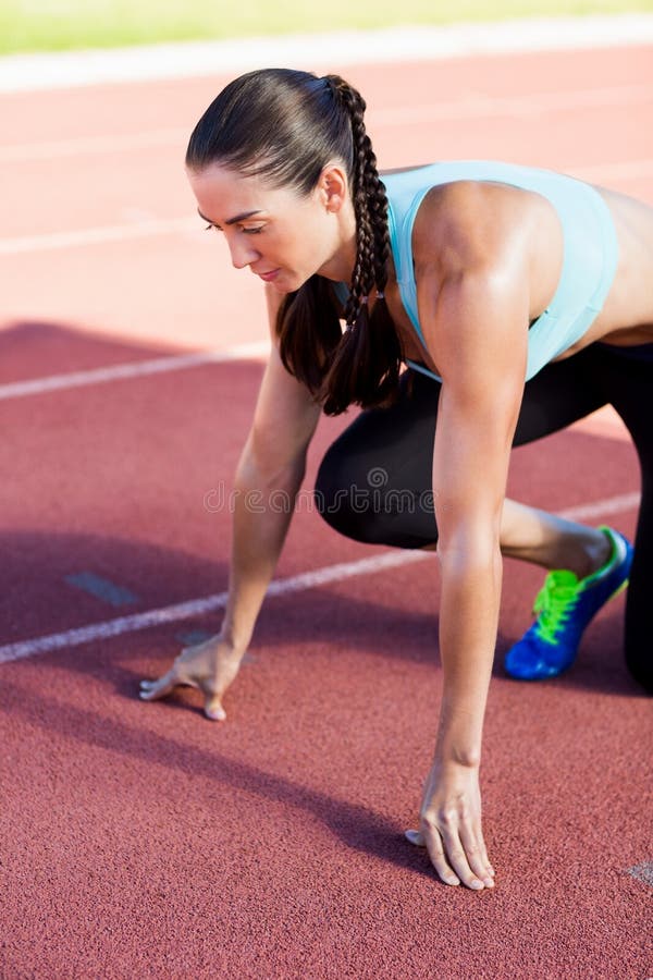 Female Athlete in Ready To Run Position Stock Image - Image of physical ...