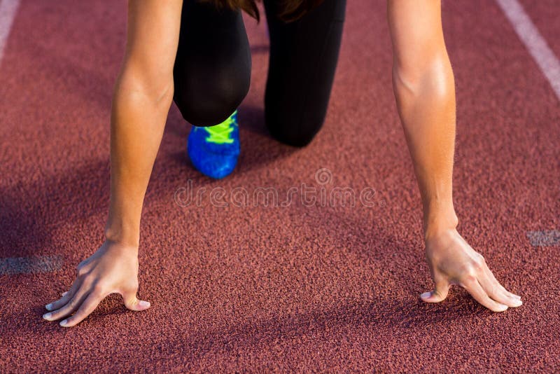 Female Athlete in Ready To Run Position Stock Image - Image of outdoors ...