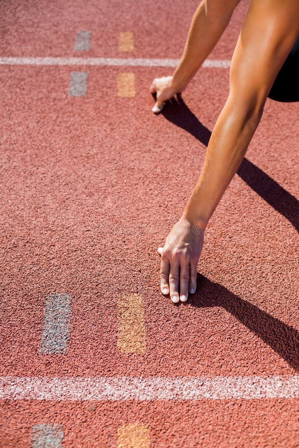 Female Athlete Ready To Run Stock Image - Image of speed, olympic: 77653641