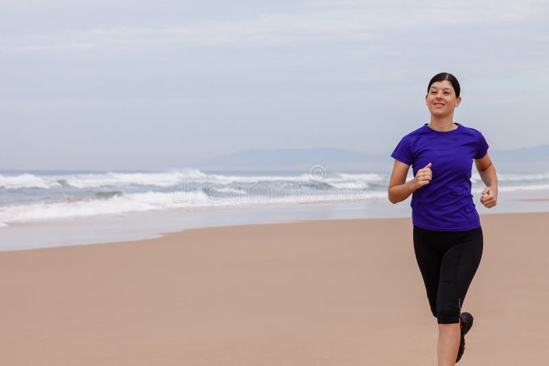 Female Athlete Running at the Beach Stock Photo - Image of woman ...