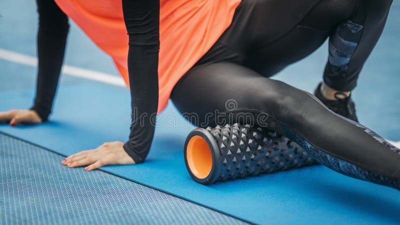 Female Athlete Using Foam Roller Stock Photo - Image of class, foam ...
