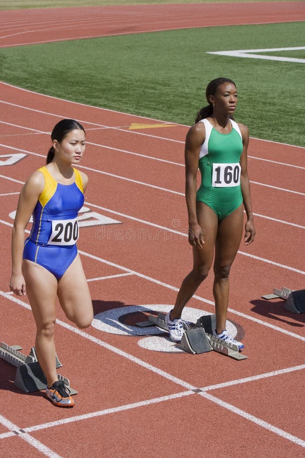 Female Athletes at Starting Blocks Stock Image - Image of person, asian ...
