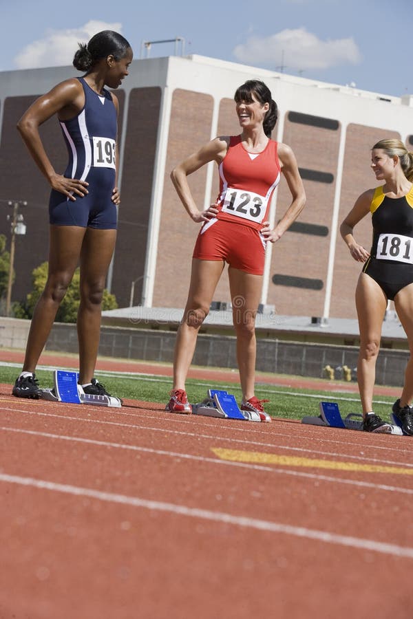Female Athletes at Starting Blocks Stock Photo - Image of multiracial ...