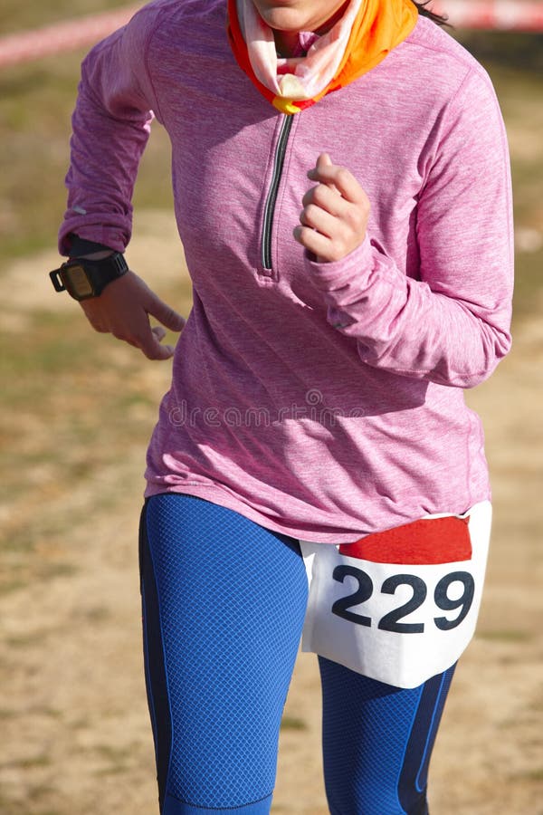 Female Athletic Runner on a Race. Outdoor Circuit Stock Photo - Image ...
