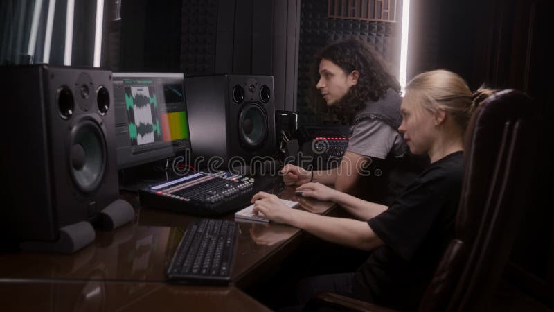Female Audio Engineer and Singer Create Song in Recording Studio Stock ...