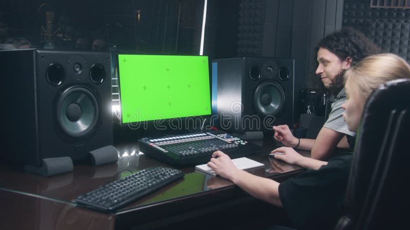 Female Audio Engineer and Singer Create Song on PC Stock Footage ...