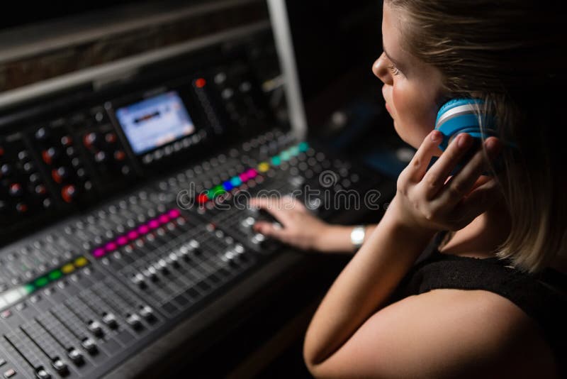 Female Audio Engineer Using Sound Mixer Stock Image - Image of ...