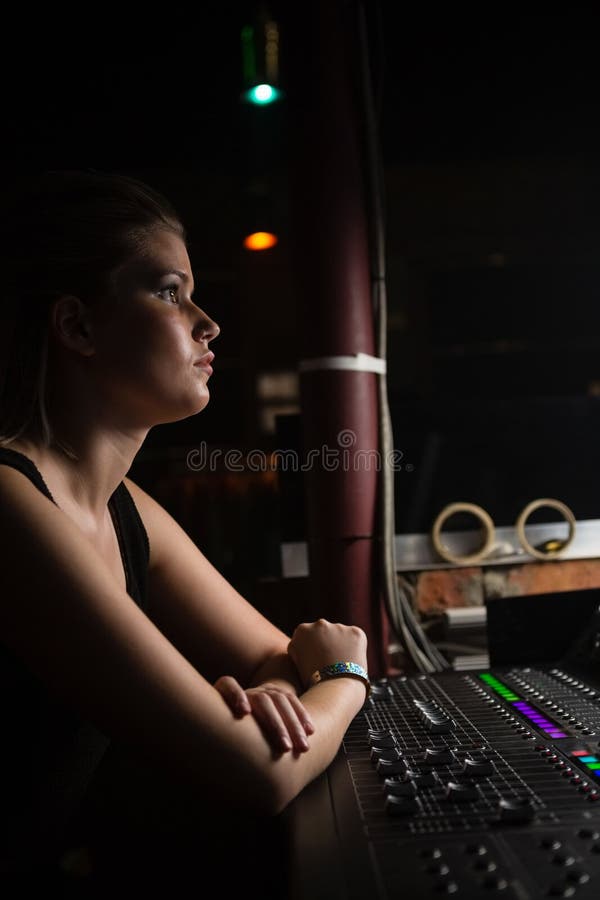 Female Audio Engineer Using Sound Mixer Stock Photo - Image of ...