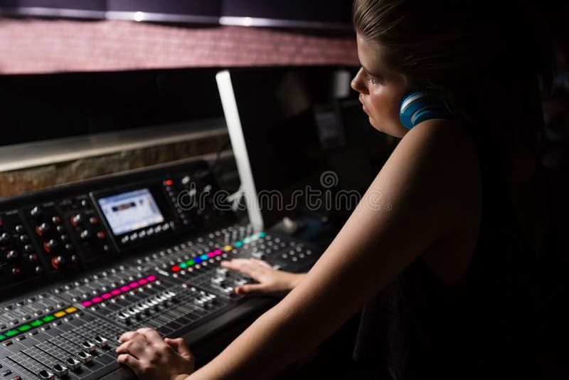 Female Audio Engineer Using Sound Mixer in Recording Studio Stock Image ...