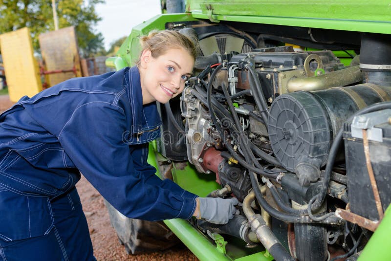 Female Auto Mechanic Fixing Engine Car Outdoors Stock Photo - Image of ...