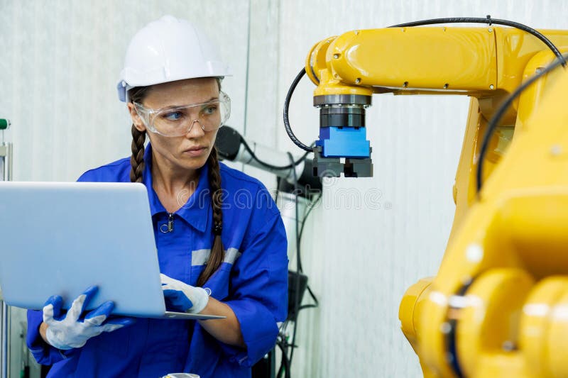 Female Automation Machine Engineer Student Study and Inspection Control Robot Arm Machine in ...