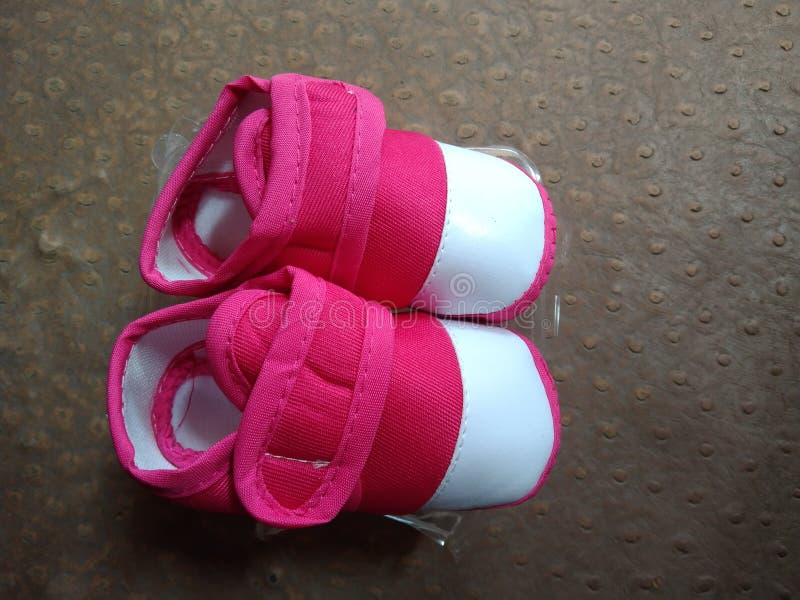 Female baby shoe stock image. Image of hand, pink, clothing - 259167137
