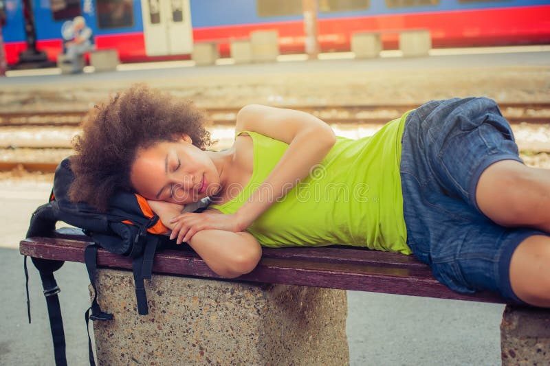Female Backpacker Tourist Napping on a Bench Stock Image - Image of ...