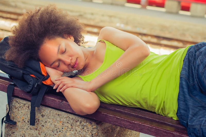 Female Backpacker Tourist Napping on a Bench Stock Photo - Image of ...